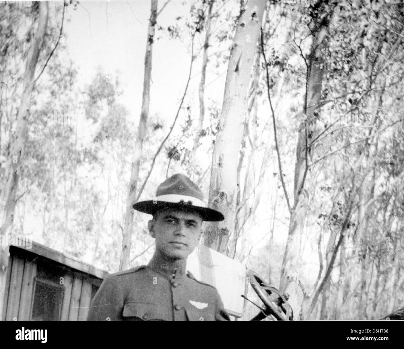 T. Claude Ryan, also known as Claude Ryan, is shown conducting forest ...