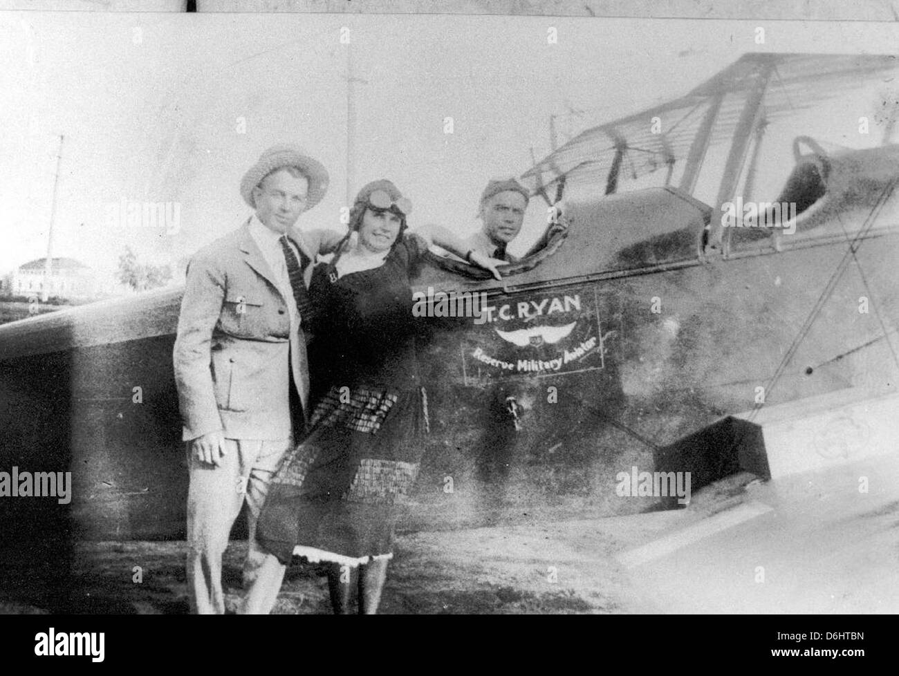 This photograph captures T. Claude Ryan, an aviation pioneer, with ...