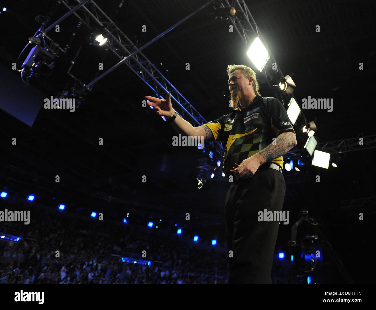 18.04.2013 Dublin, Ireland. Simon Whitlock throws his dart flights into ...