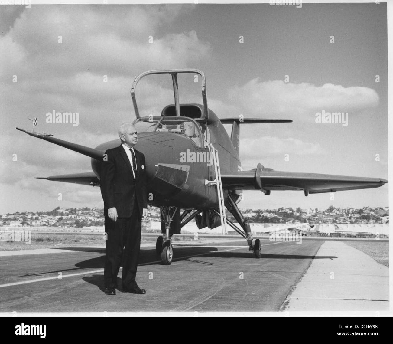 T. Claude Ryan, an aviation pioneer, is depicted in this image with his ...