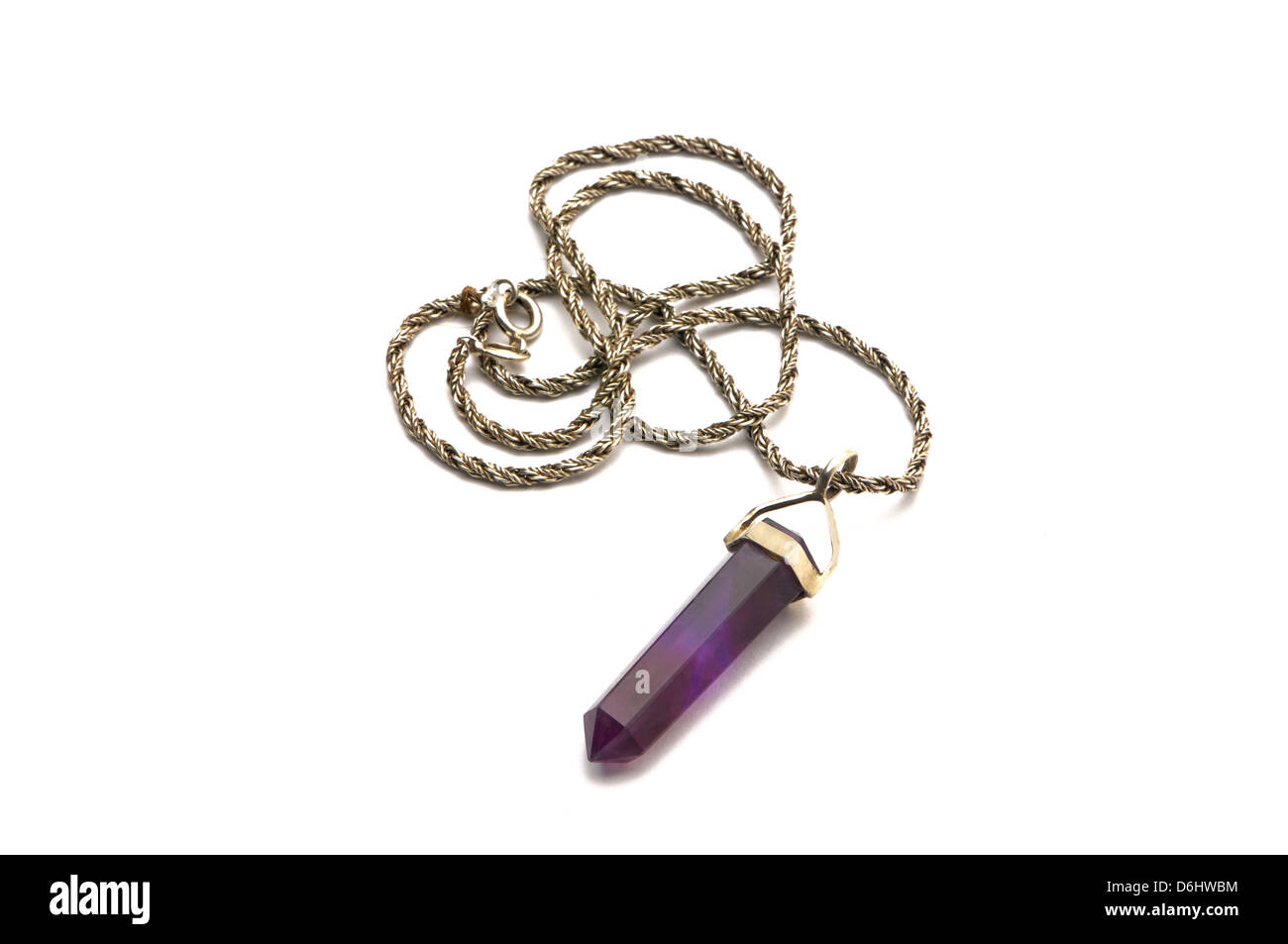 amethyst pendant with silver chain on white background Stock Photo - Alamy