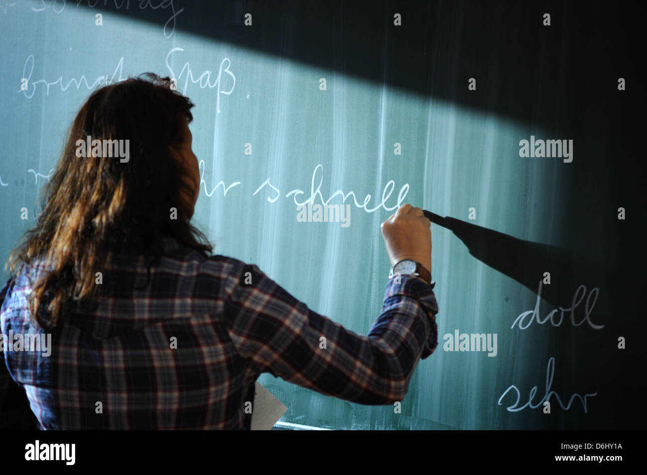 Berlin, Germany, a teacher at the blackboard Stock Photo - Alamy