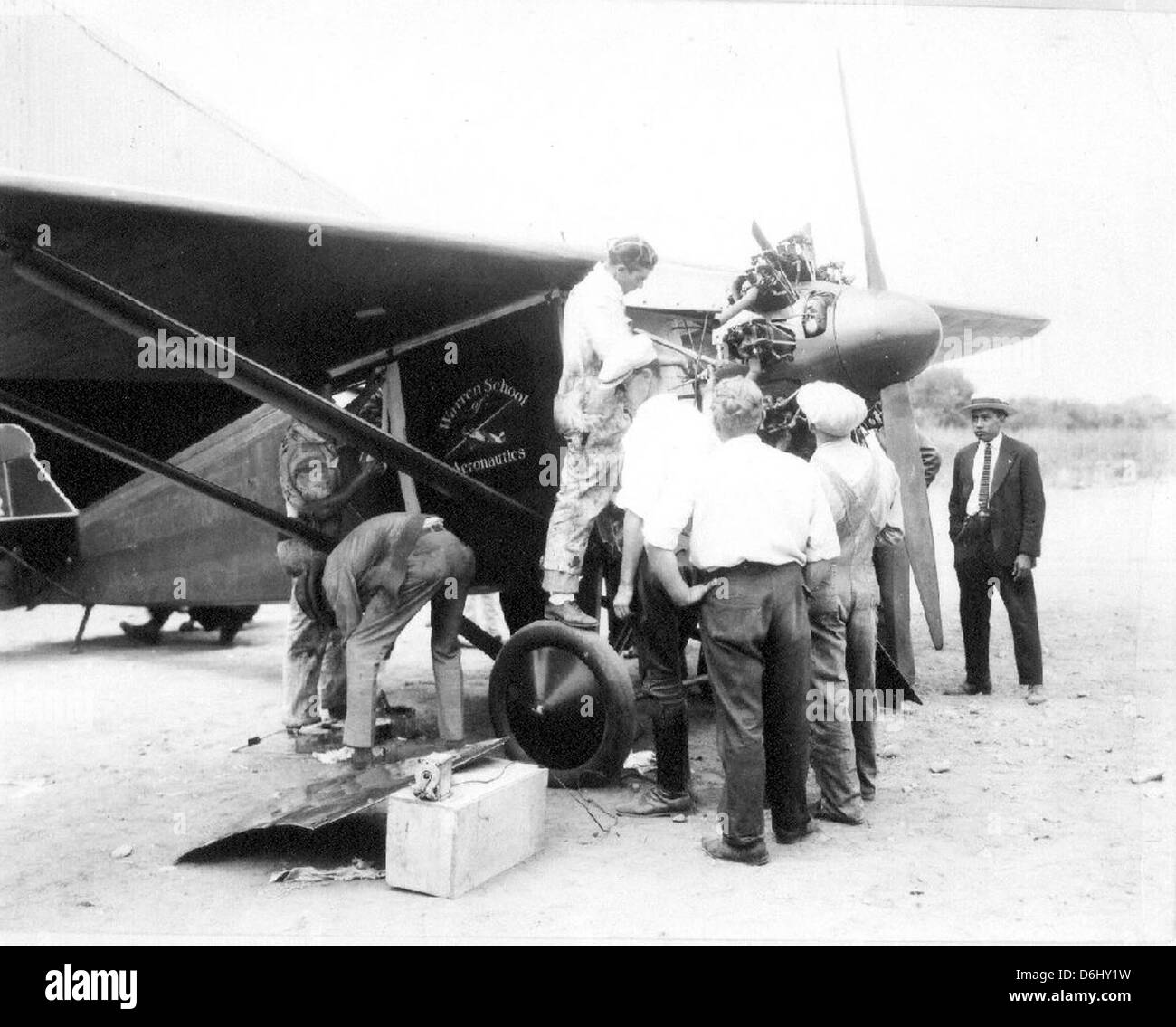 This photo from 1928 shows mechanics working on the Ryan M-1 aircraft ...