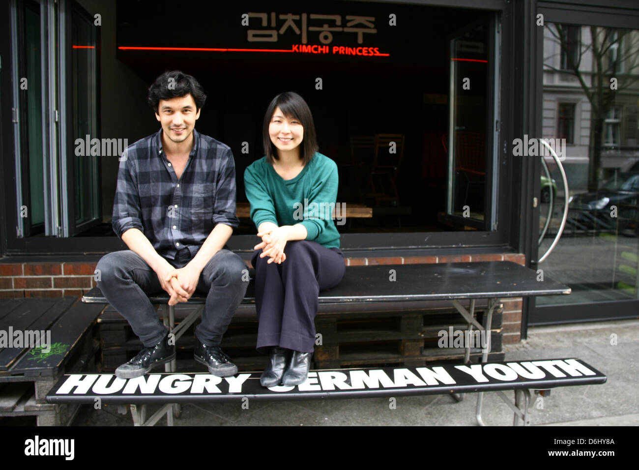 Hyun Wanner (L) and Young-Mi Park-Snowden sit in front of their ...