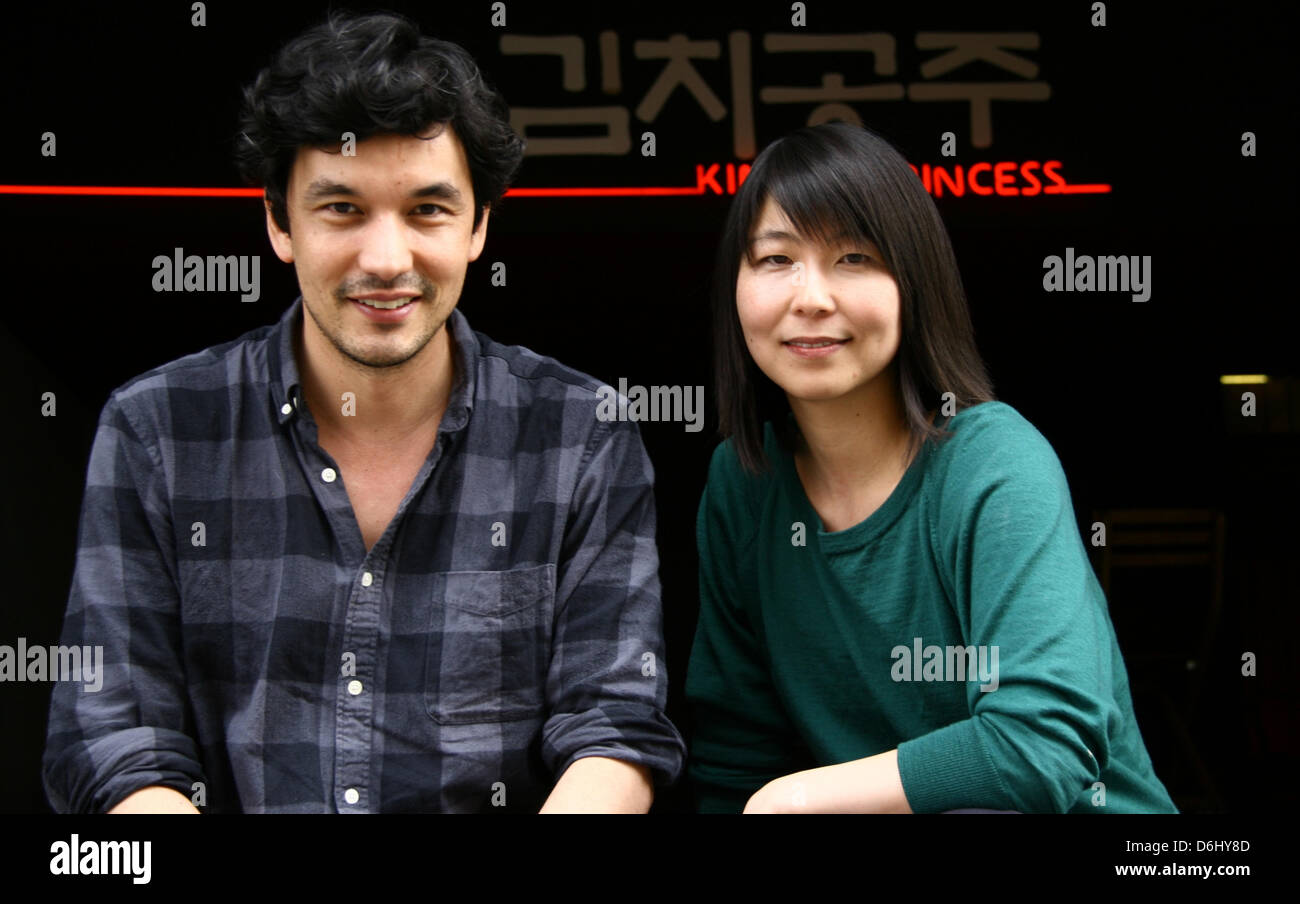 Hyun Wanner (L) and Young-Mi Park-Snowden sit in front of their ...