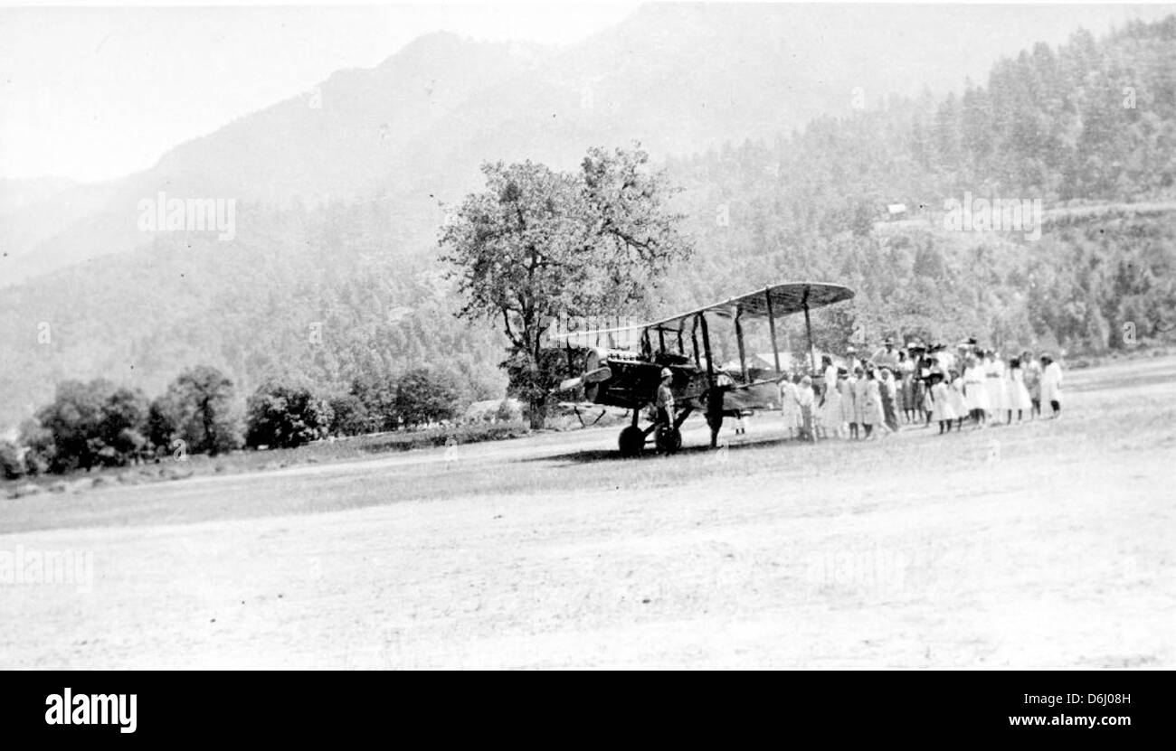 A group of individuals is shown gathered around a forest patrol DH ...