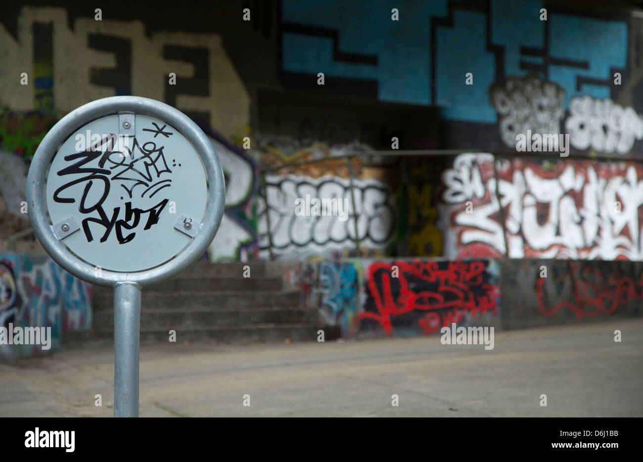 Graffiti and sign post in Basel, Switzerland Stock Photo - Alamy
