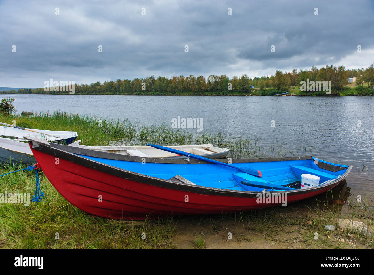Sweden, Norrbotten. Boats along the Laino River in Lannavaara Stock ...