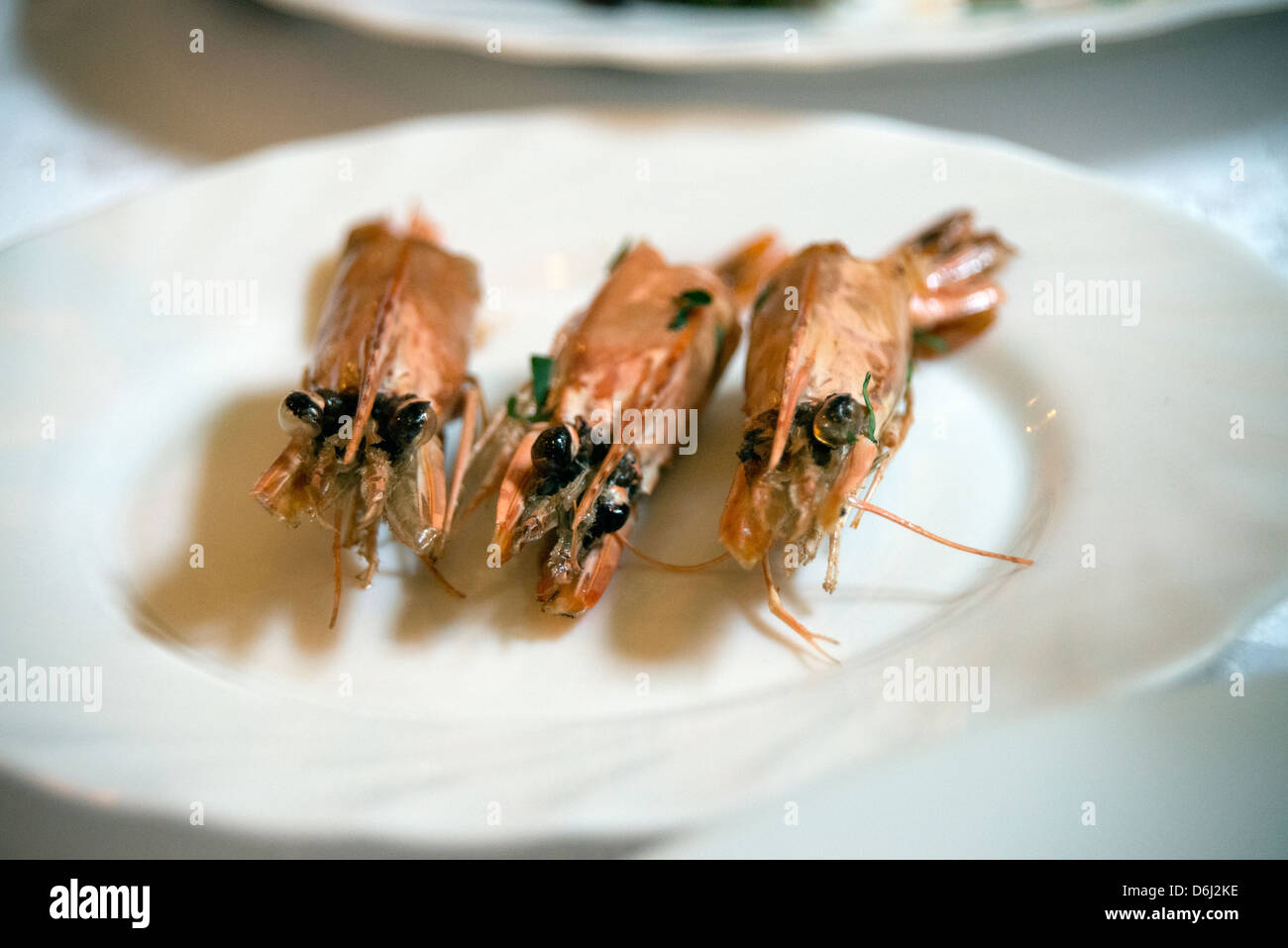 Discarded cooked shrimp heads hi-res stock photography and images - Alamy