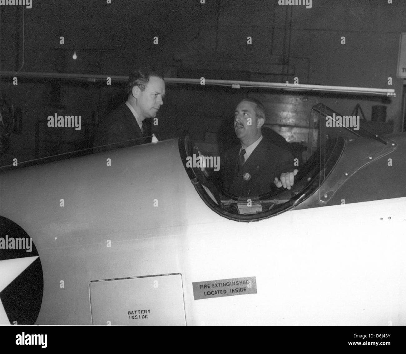 Charles Lindbergh, alongside aviator 'Dapper Dan' Burnett, is seen in ...
