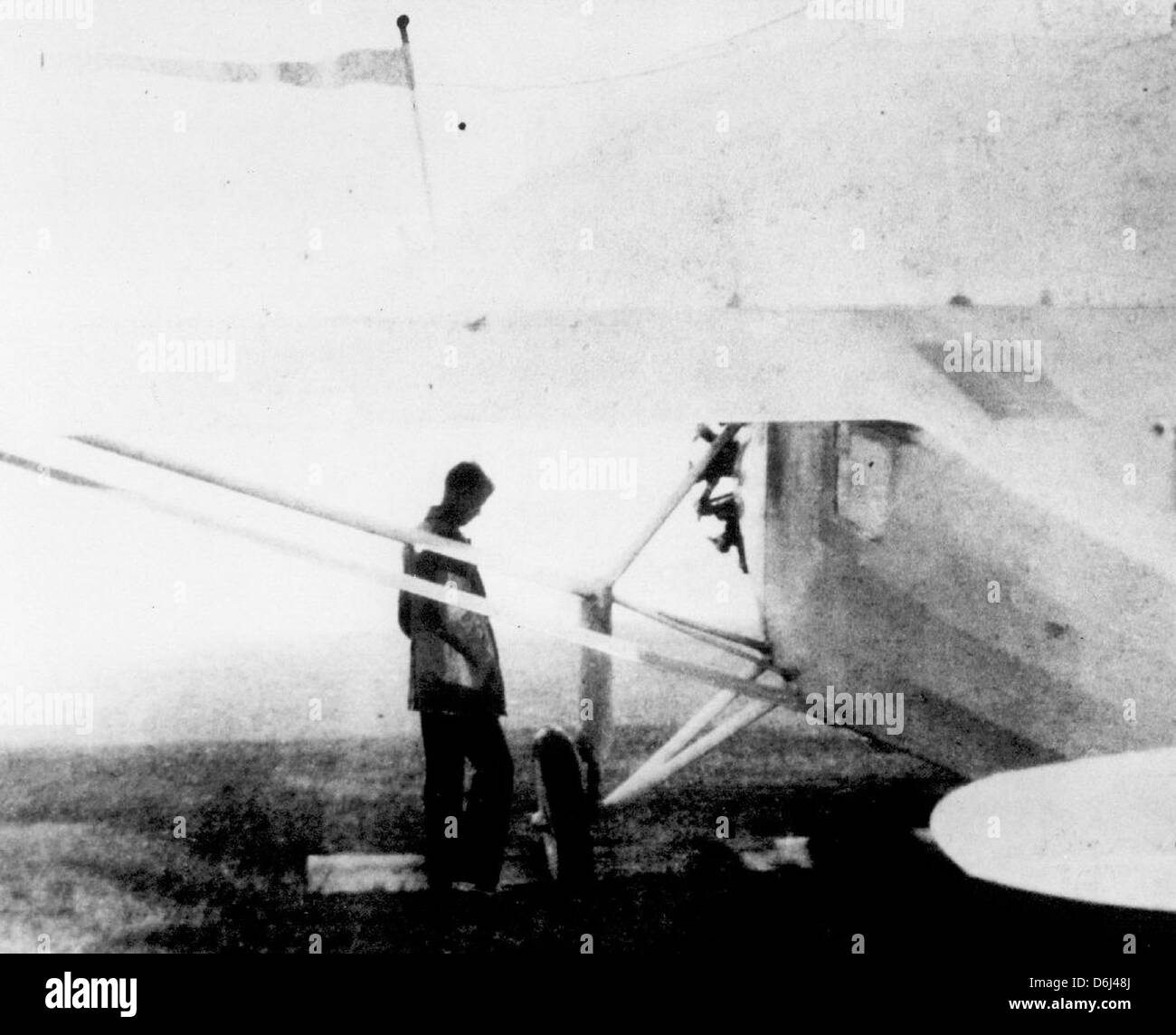 This image features Charles Lindbergh, renowned for his historic solo ...