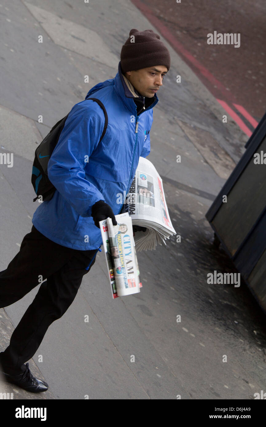 The newspaper vendor hi-res stock photography and images - Alamy