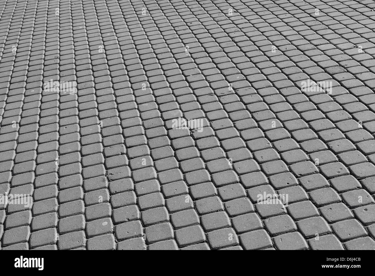 Background texture of modern gray cobblestone pavement surface Stock ...