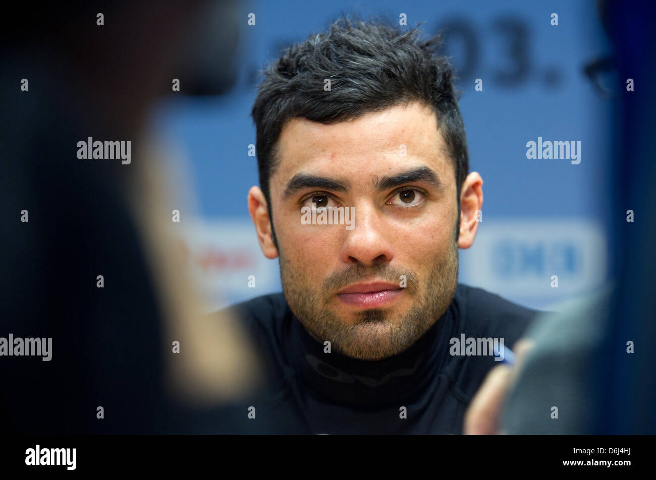 French biathlete Simon Fourcade sits during a press conference for the ...