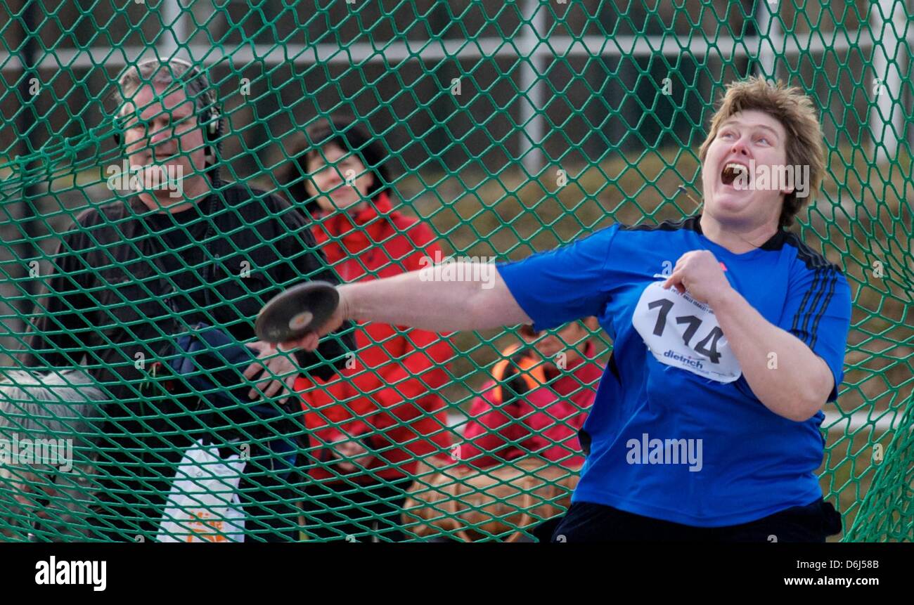 German discus thrower Ilke Wyludda throws the discus at the Brandberge ...