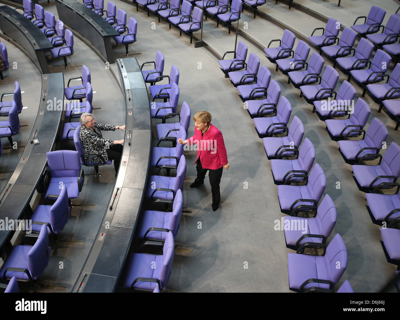 German Chancellor Angela Merkel (R) and former German minister od ...