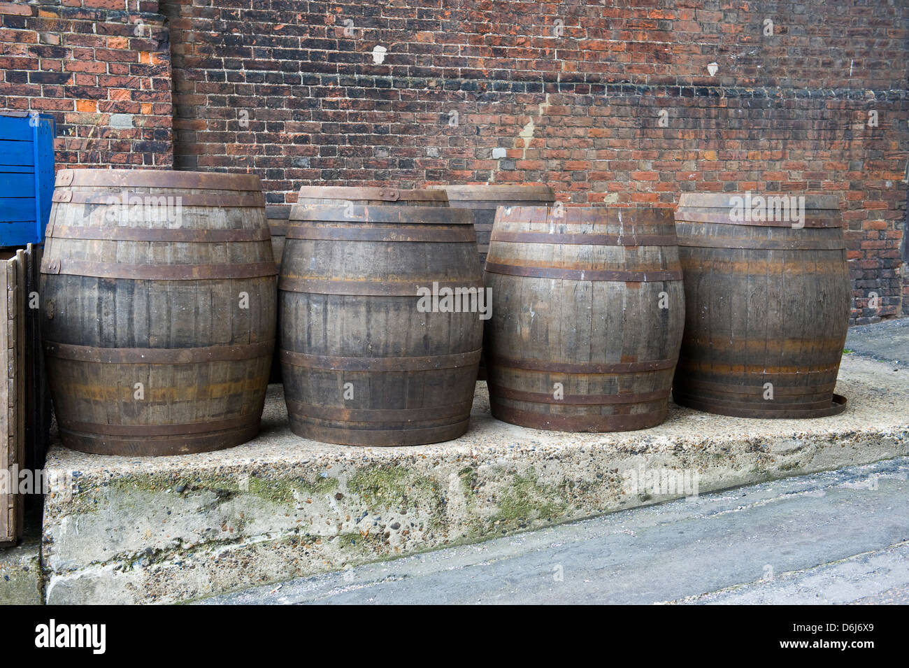 Wooden barrels at port Stock Photo - Alamy