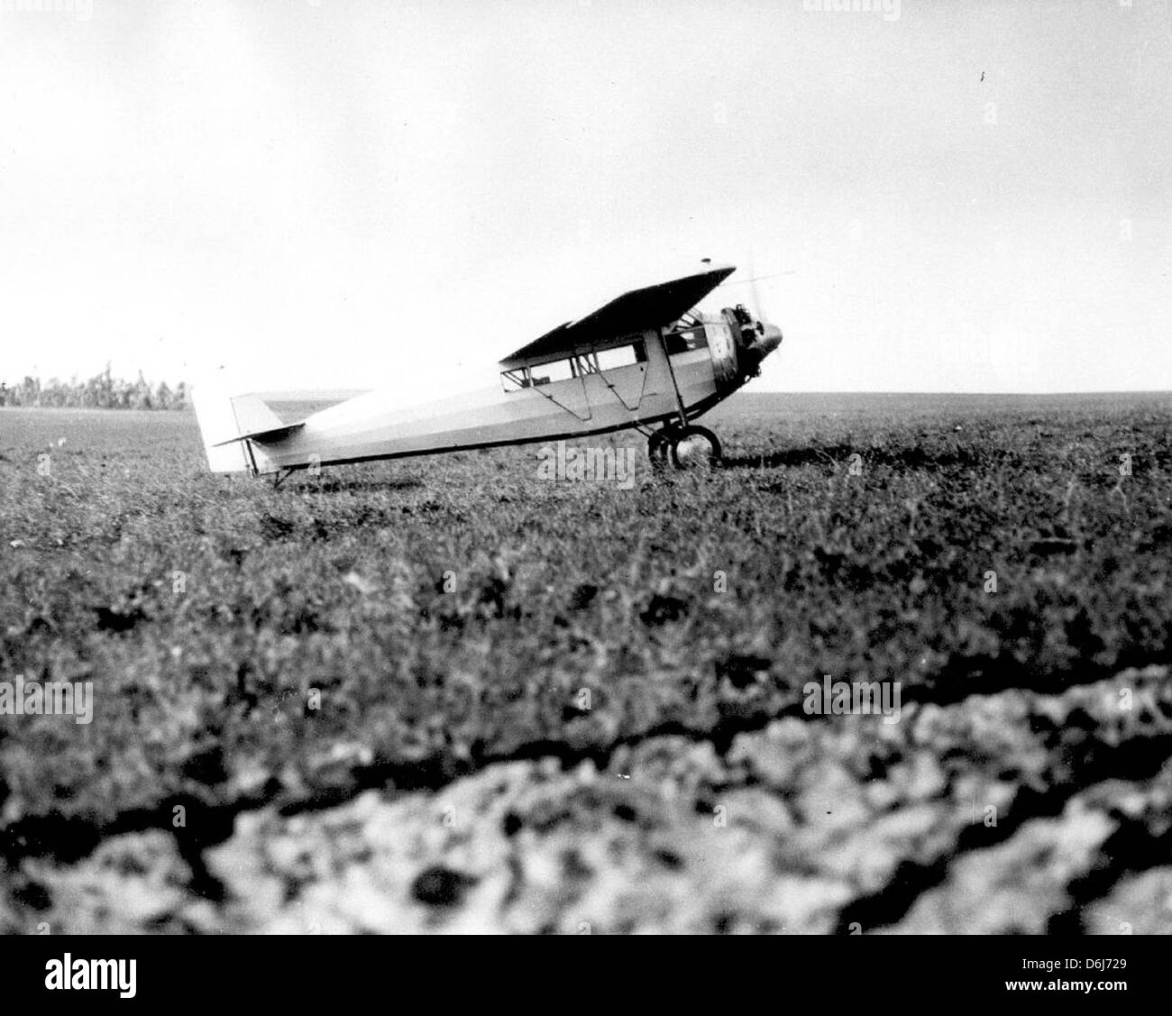 This 1928 photograph features mechanics working on the Ryan M-1 ...