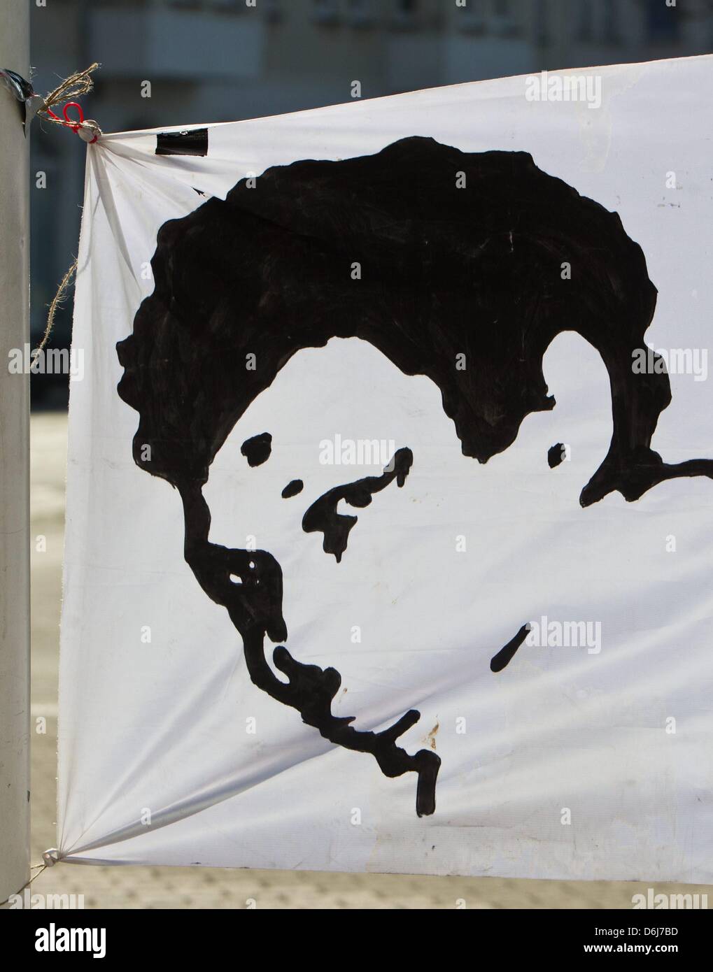 A banner shows Oury Jalloh during a demonstration in front of the ...
