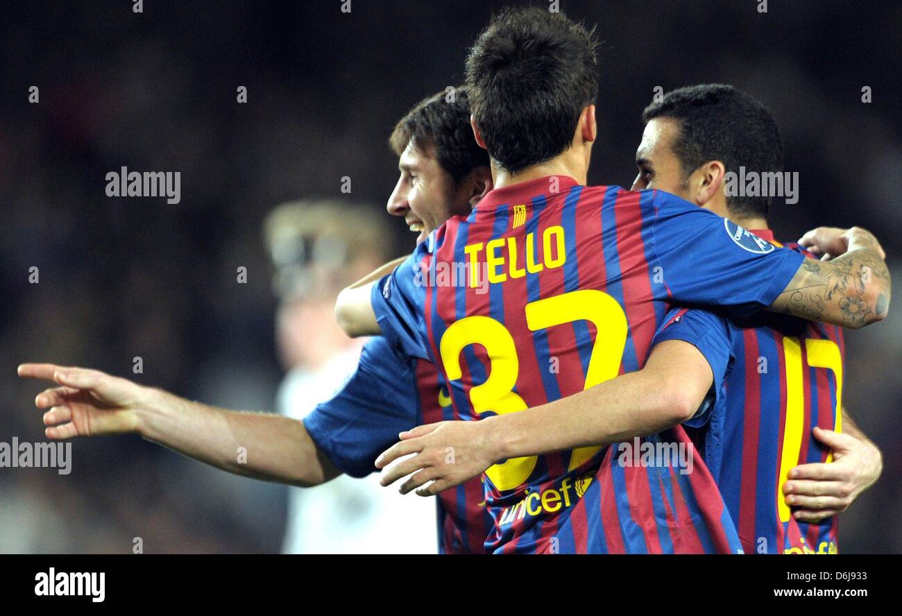 Barcelona's Lionel Messi (L-R) celebrates with team mates Cristian ...