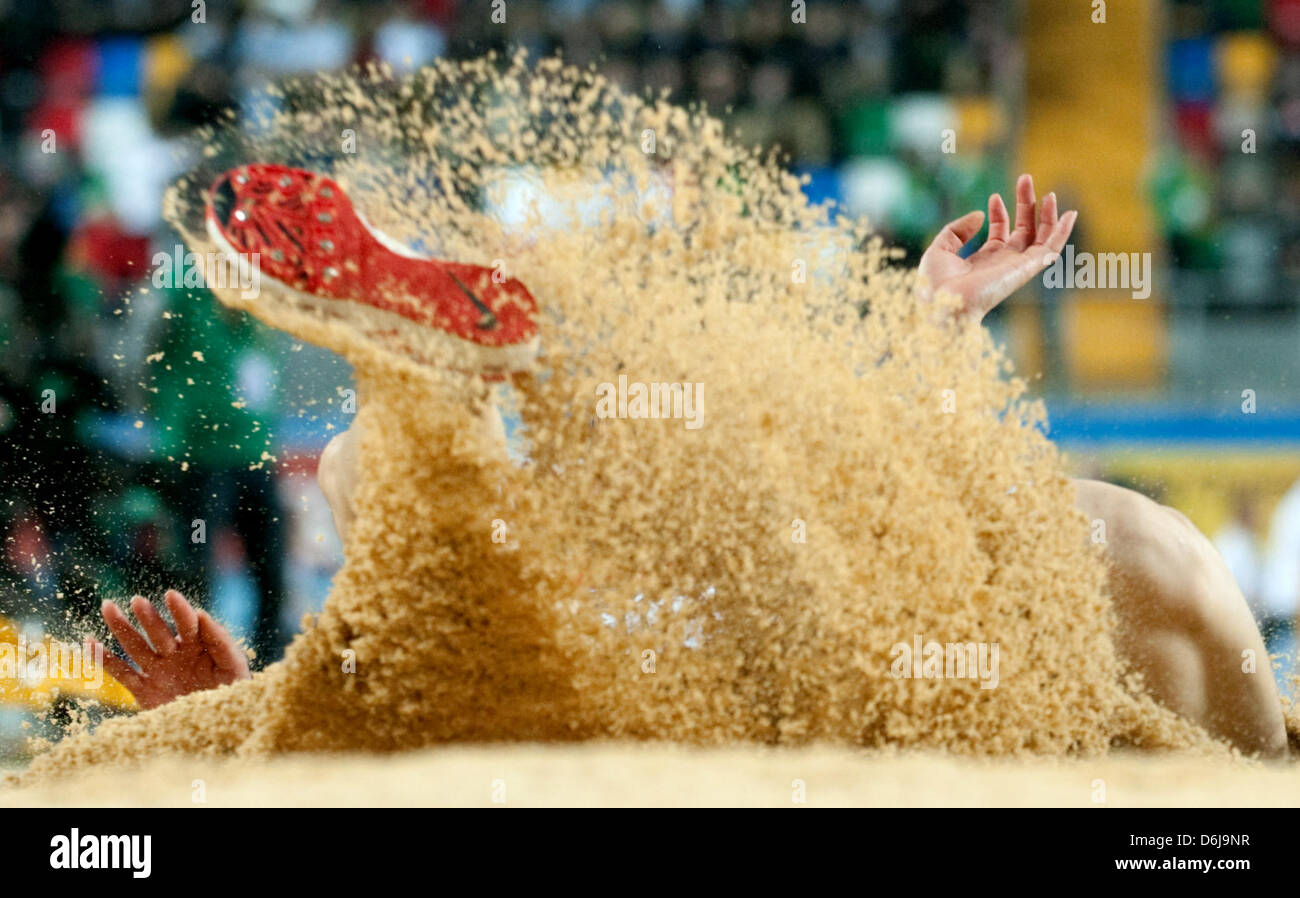 Yanmei Li of China competes in the Women's Triple Jump qualification at ...