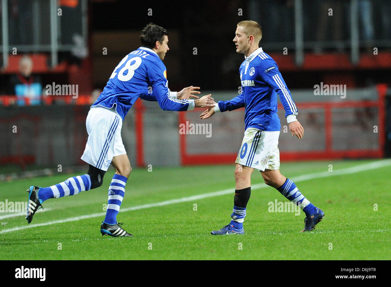 Schalke's players Christoph Moritz (L) steps onto the pitch in exchange ...
