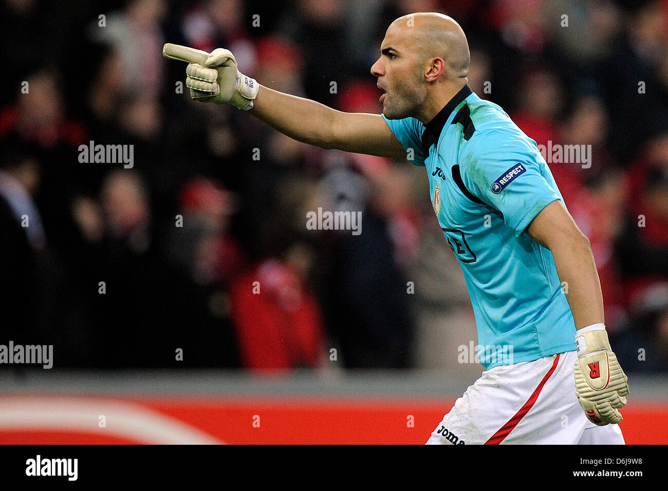Goalkeeper Sinan Bolat of Liege reacts during the Europa League round ...