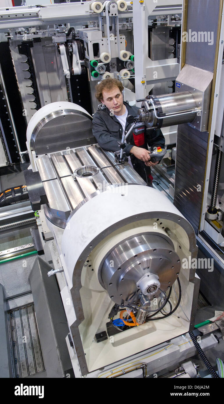 André Reinhold works on a 5-axis machining center at the StarragHeckert ...