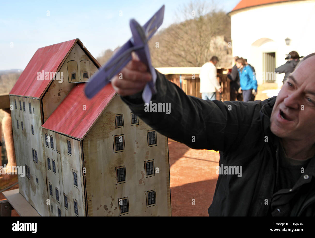 British Ian Duncan (producer) holds a model of the "Colditz Glider" in ...