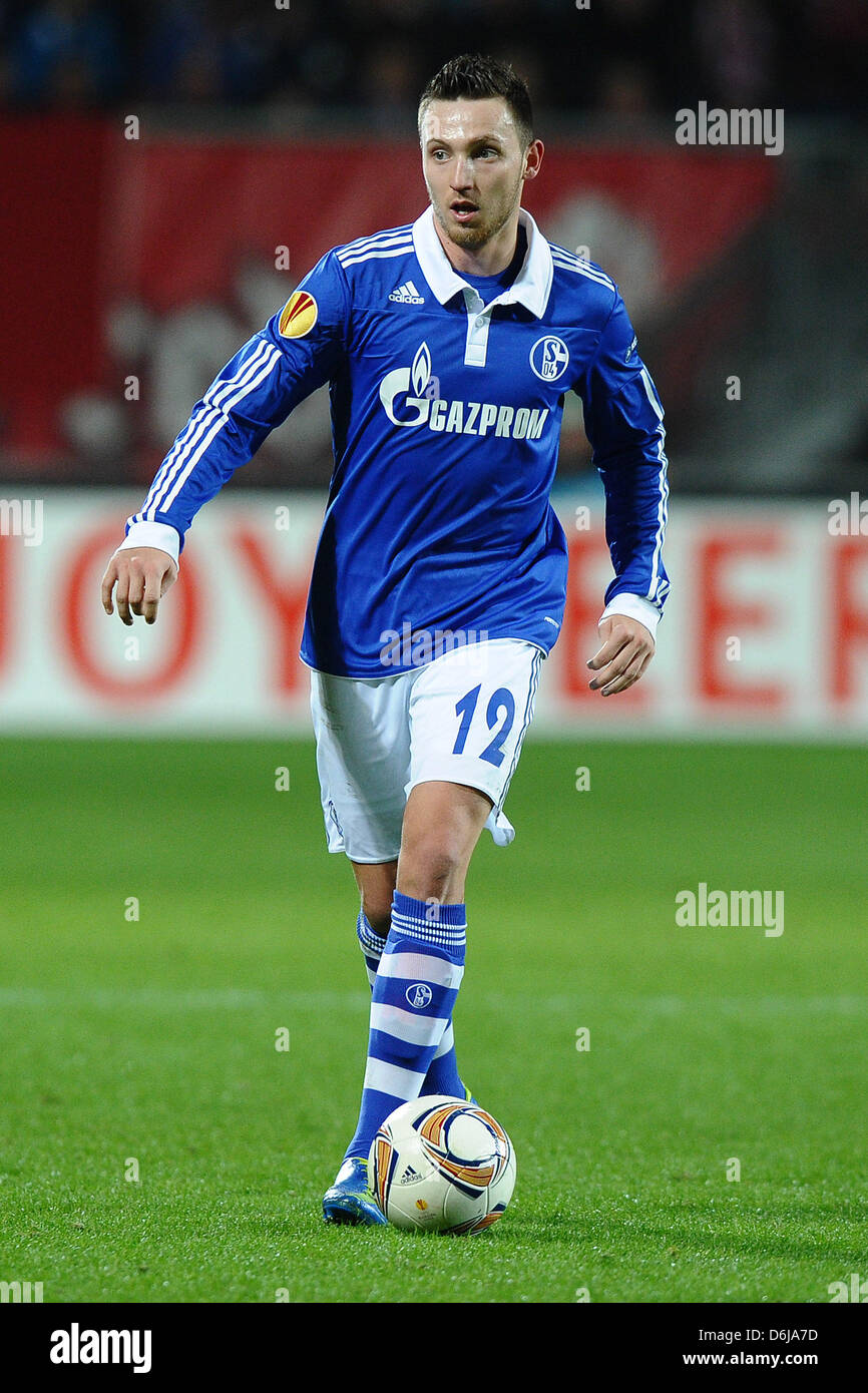 Schalke's Marco Hoeger kicks the ball during the Europa League soccer ...