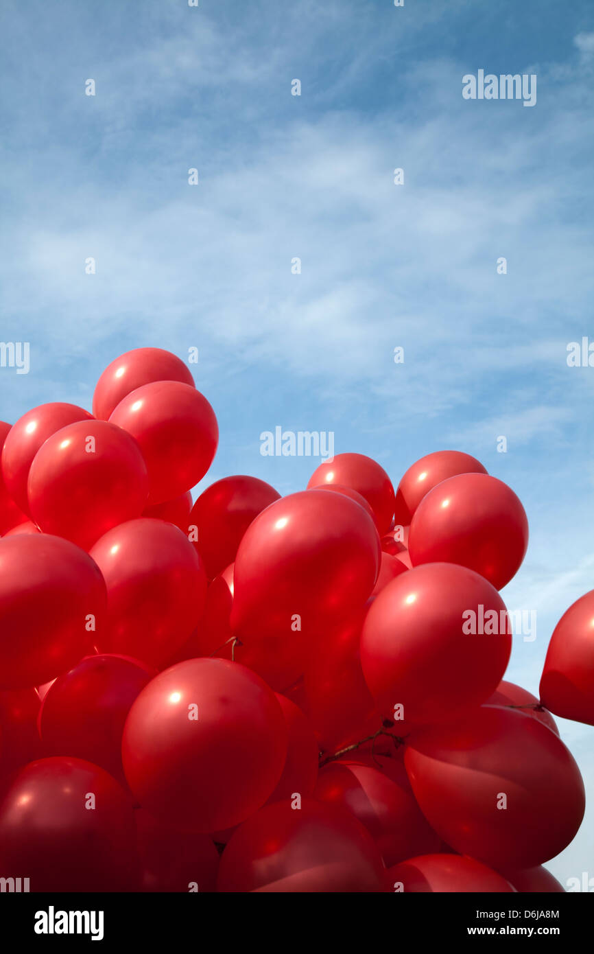 Big Bunch of Red Balloons Stock Photo - Alamy