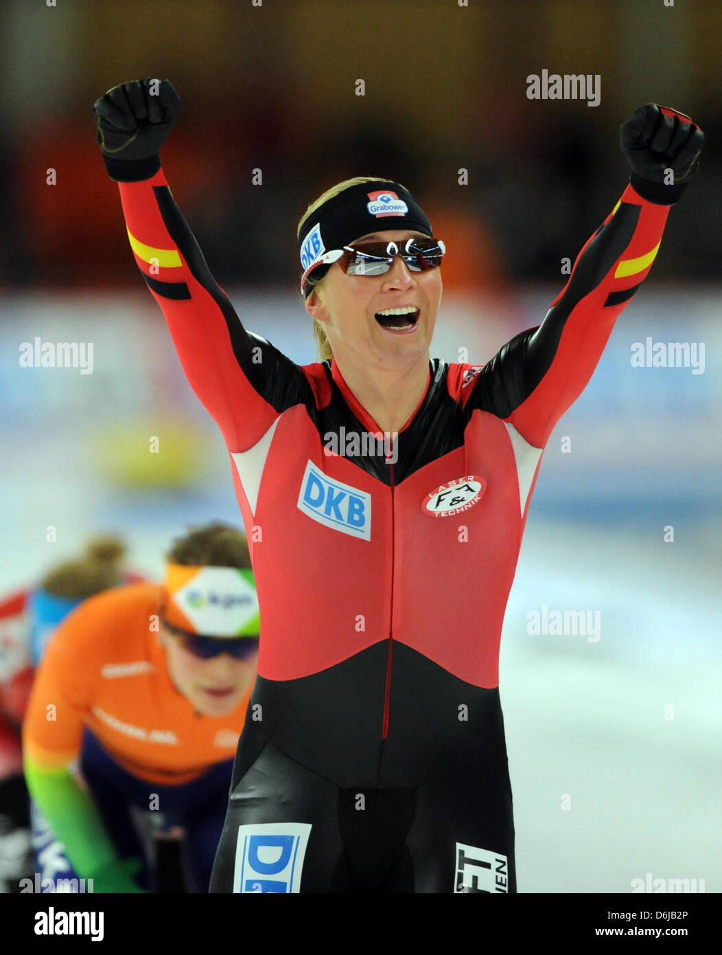 German speed skater Claudia Pechstein cheers after winning the mass ...