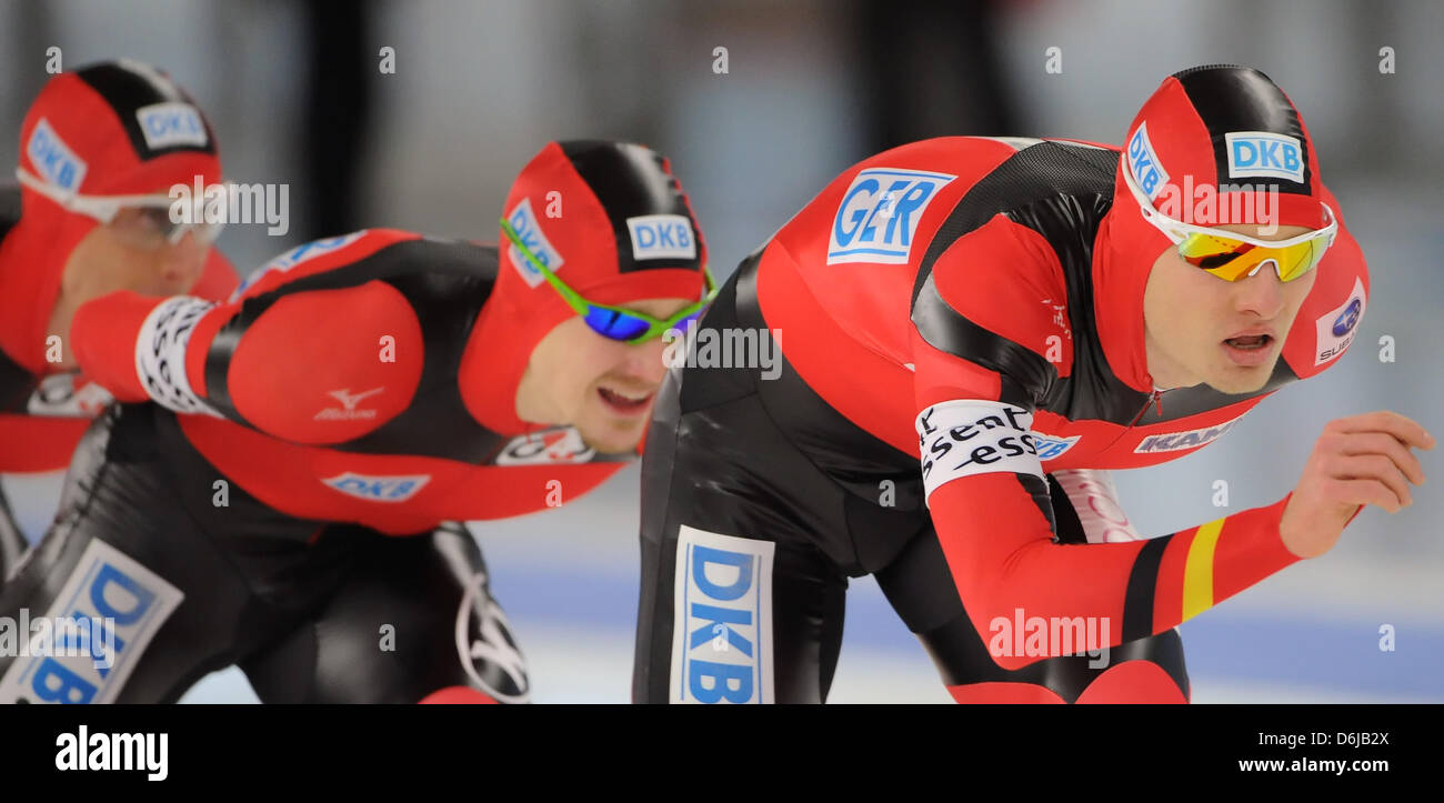 The German speed skating team in action in the team competition during ...