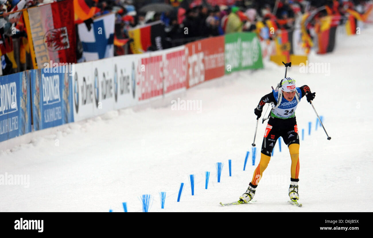 German biathlete Tina Bachmann arrives at the finish line in the women ...