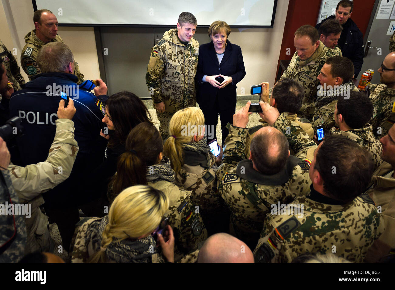 German Chancellor Angela Merkel is photographed as she visits the Army ...
