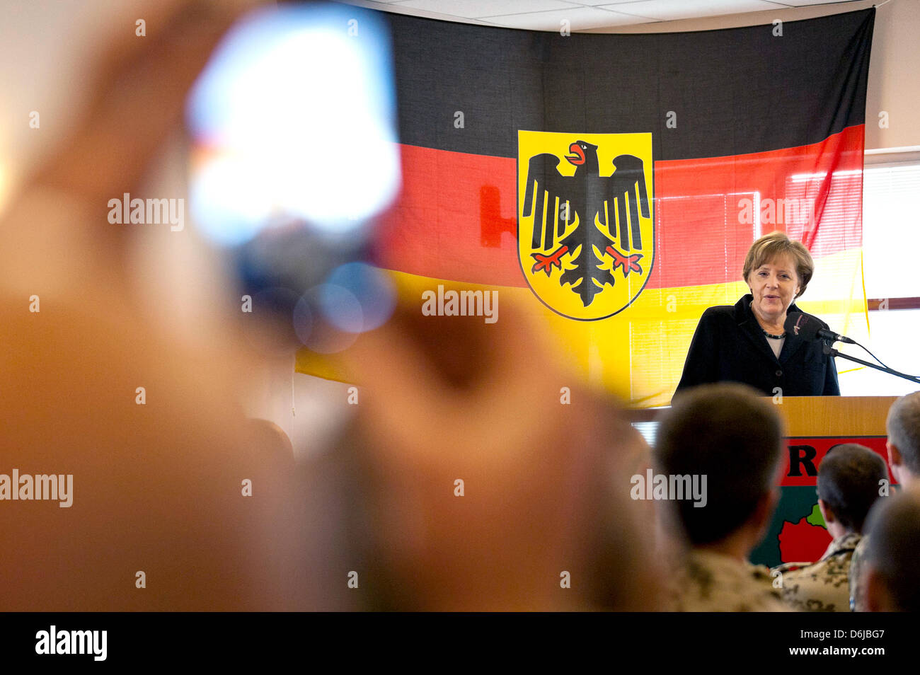 German Chancellor Angela Merkel delivers a speech as she visits the ...