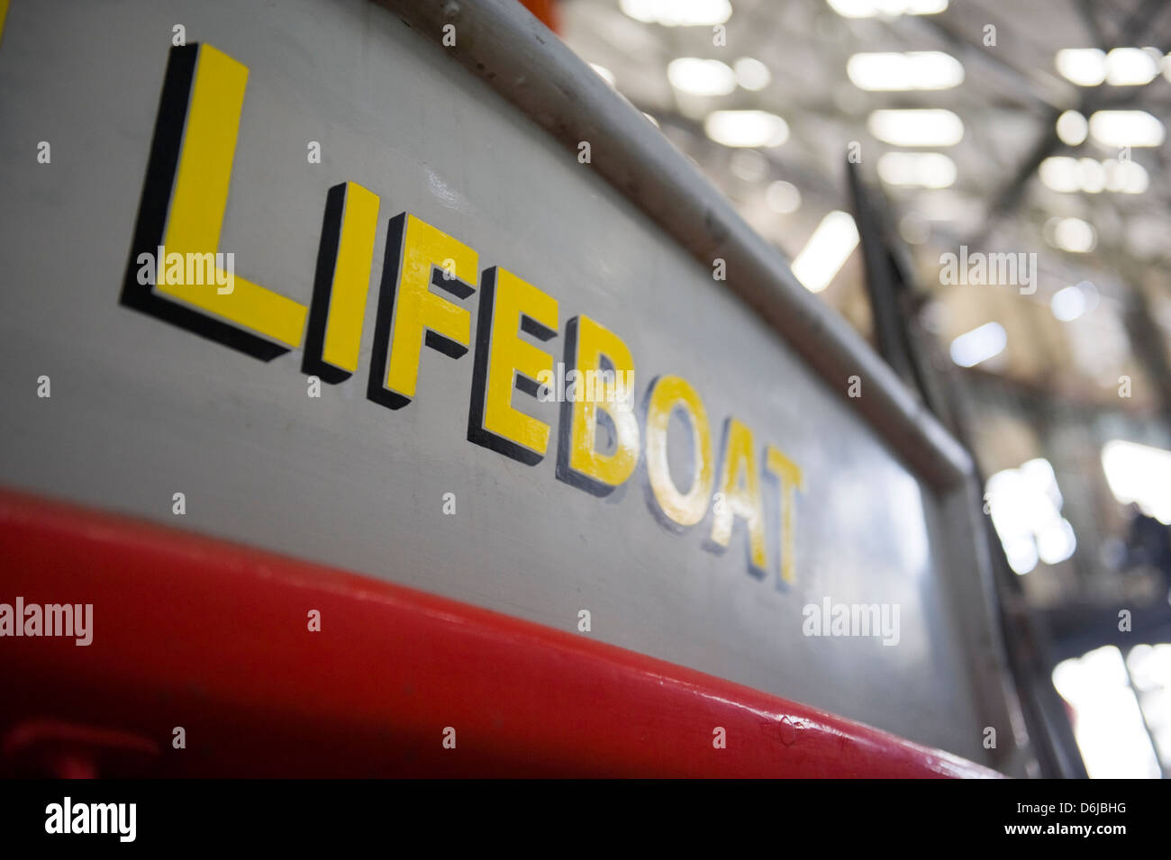 Yellow Lifeboat on boat Stock Photo - Alamy