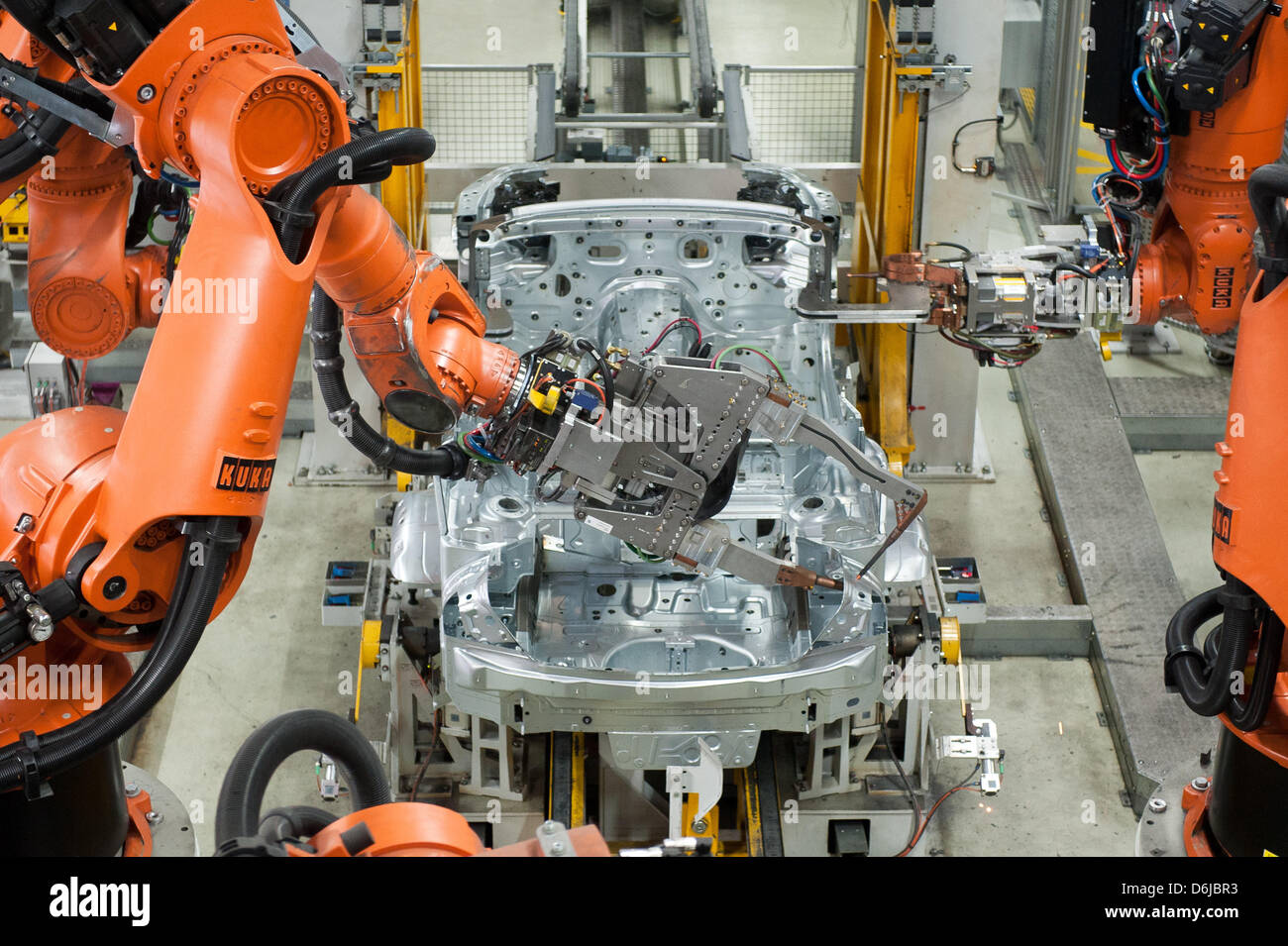 BMW robots weld inside the company's plant in Dingolfing, Germany, 12 ...