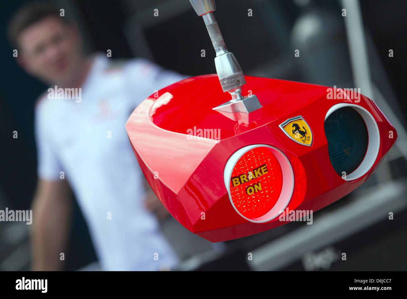 The stop lights of Ferrari is seen in front of the Ferrari teamgarage ...