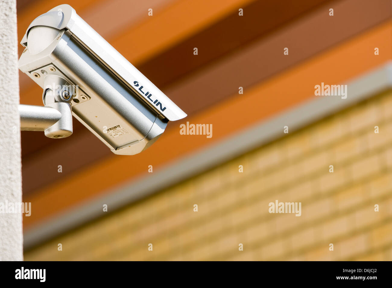 Security CCTV camera on side of modern building Stock Photo - Alamy