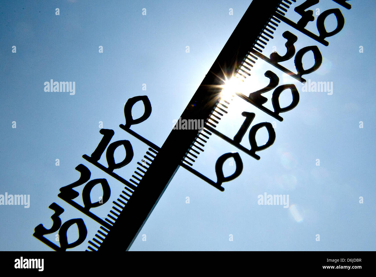 IILUSTRATION - An illustrated picture shows a thermometer being held ...