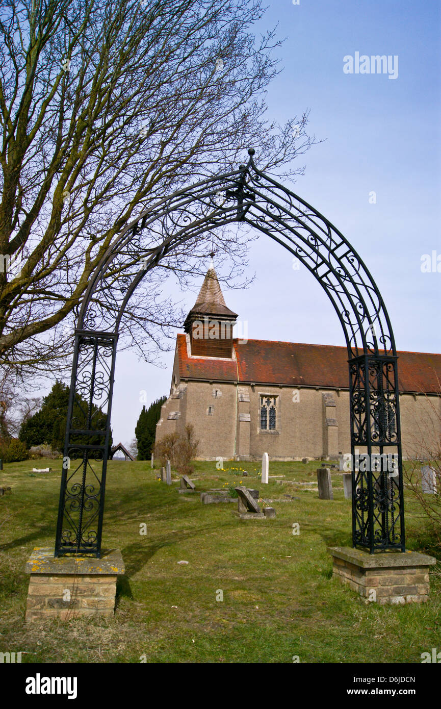 Wrought iron arch in the churchyard of St. Thomas's Church, Upshire ...