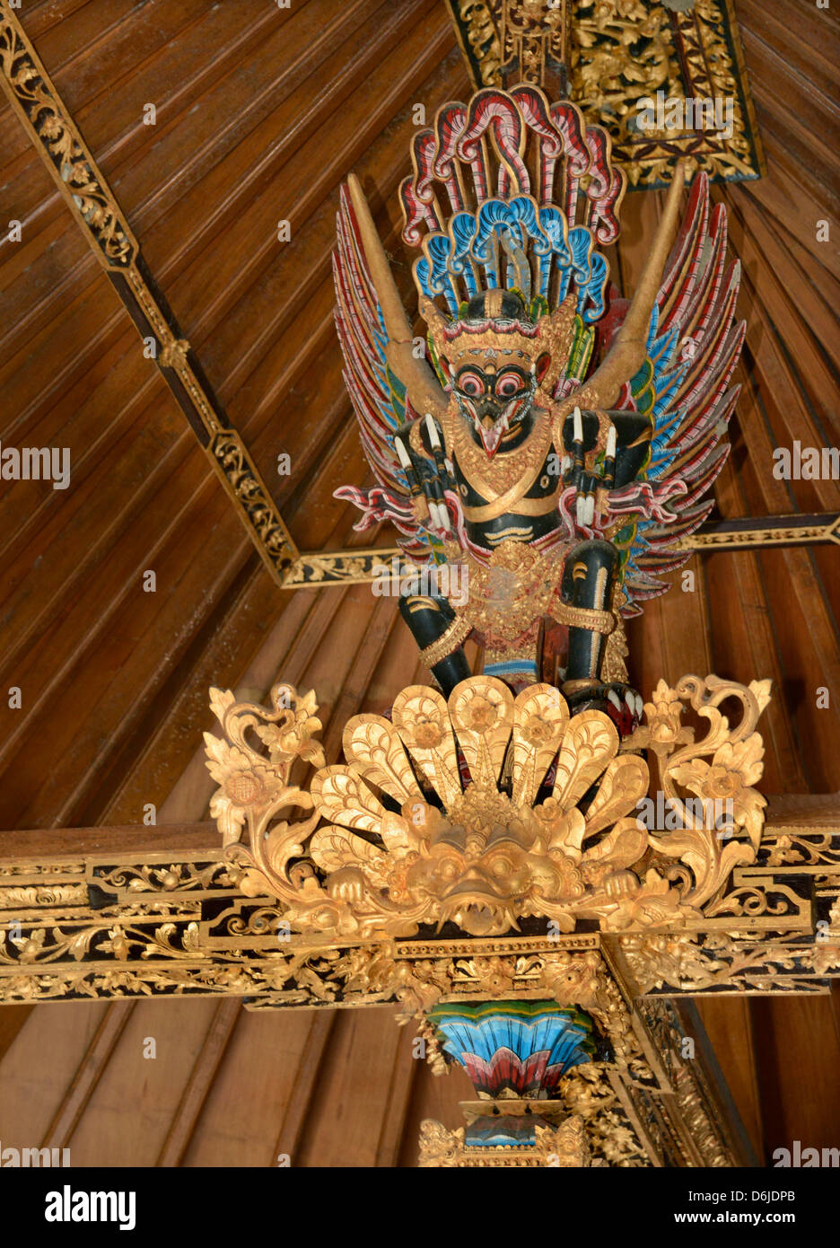 Garuda image above the bed beams of a wealthy Balinese household, Bali ...
