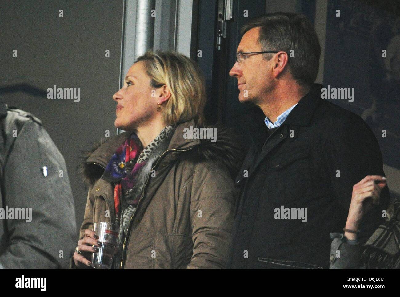 Former German President Christian Wulff and his wife Bettina are seen ...