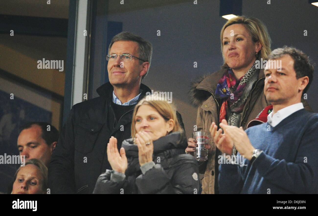 Former German President Christian Wulff and his wife Bettina are seen ...