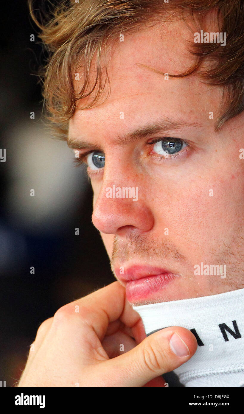German Formula One driver Sebastian Vettel of Red Bull prepares in the ...