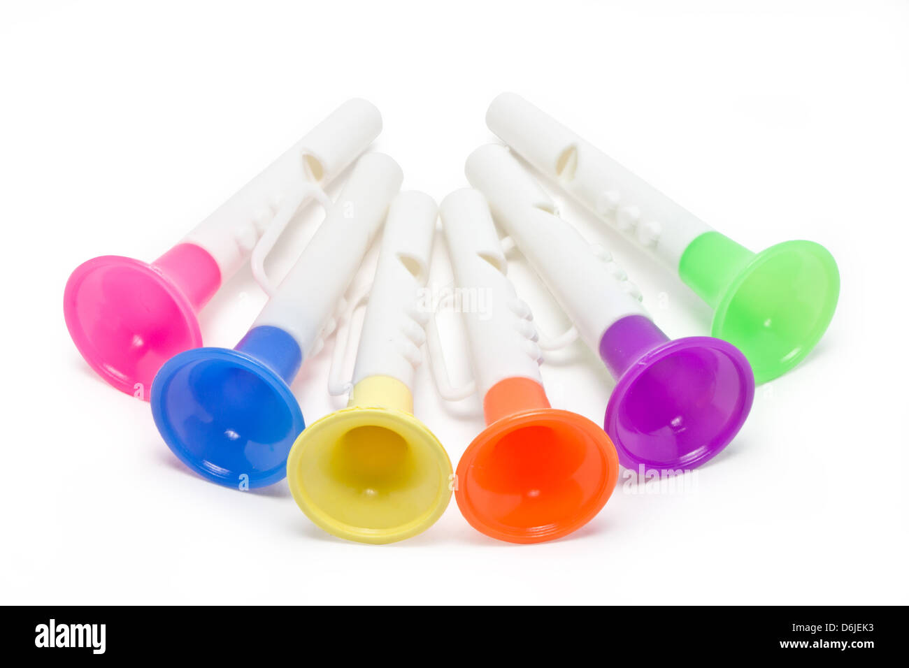 Children horn made of colored plastic isolated on white background ...