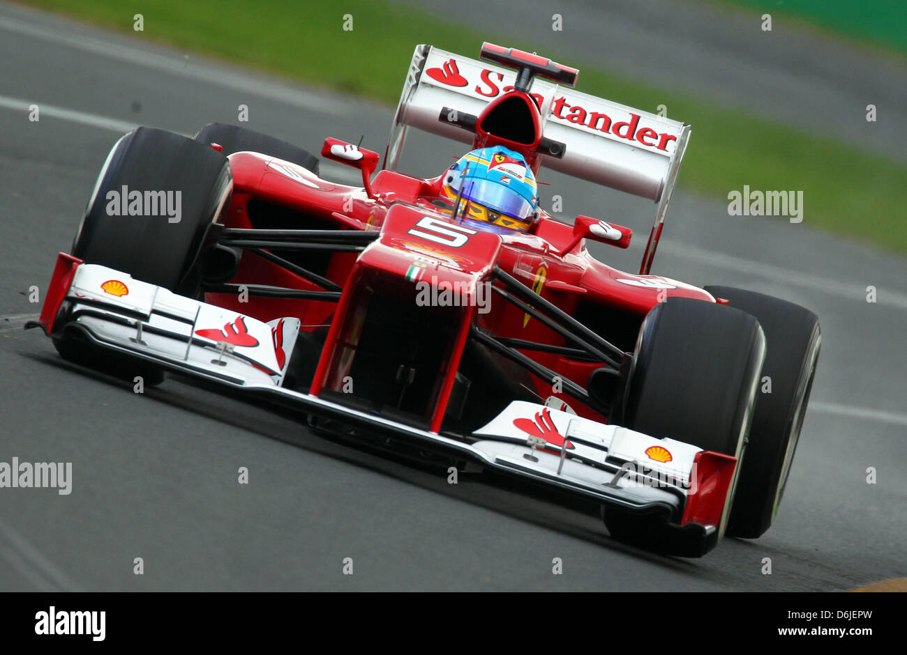 Spanish Formula One driver Fernando Alonso of Ferrari steers his car ...