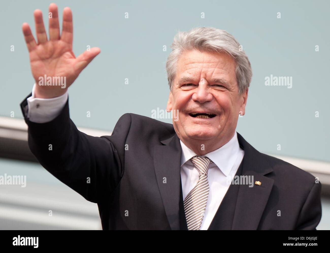 Presidential candidate Joachim Gauck waves from a balcony of the ...