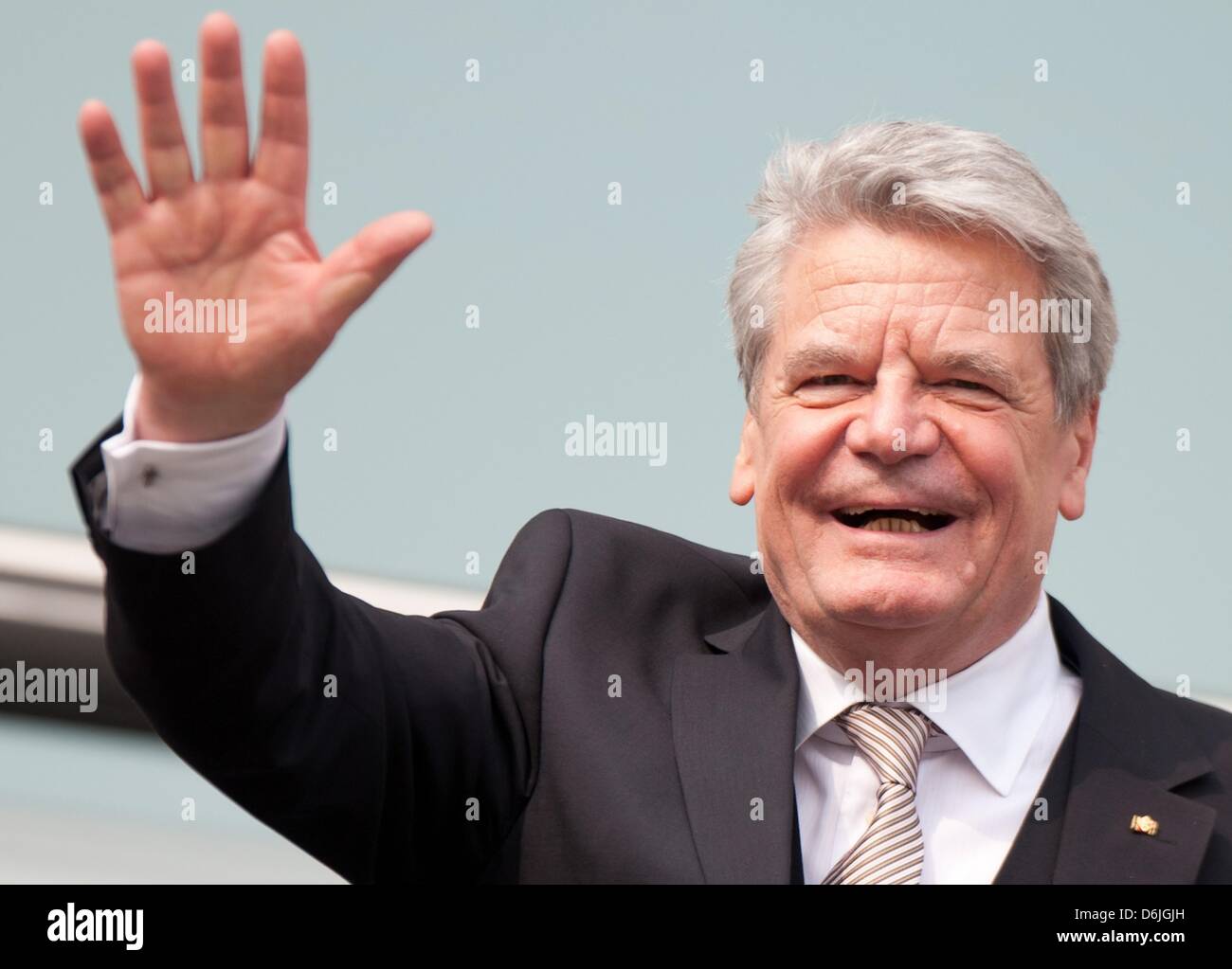 Presidential candidate Joachim Gauck waves from a balcony of the ...